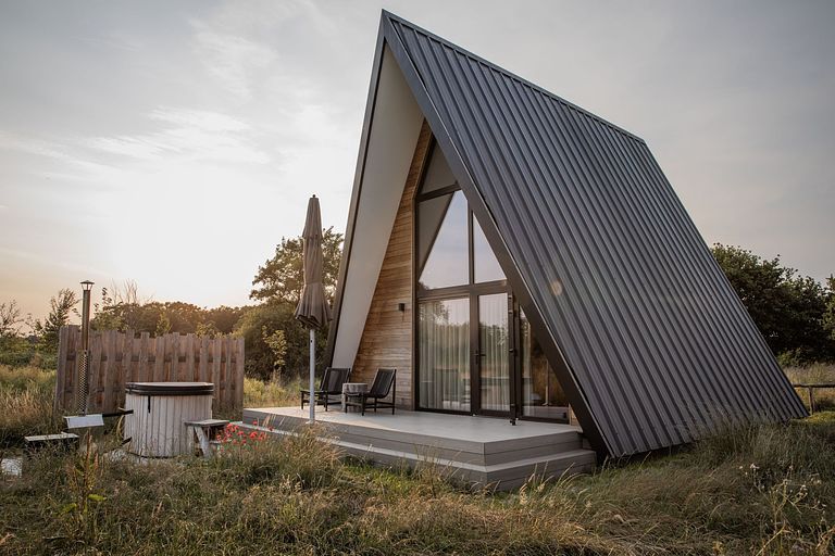 Unieke A-frame lodge met privé wellness in Hilvarenbeek